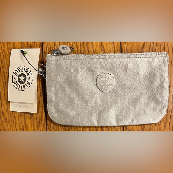 Kipling | Bags | Nwt Kipling Bright Metallic Silverclutchtop Zipper ...